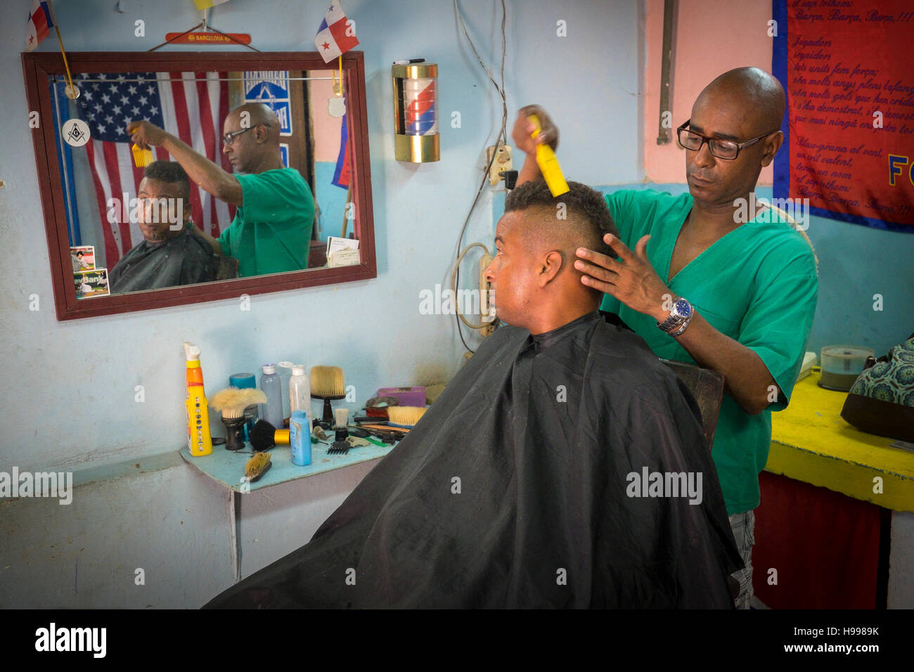 Havana, Cuba: Barber shop in Old Havana - with flags Stock Photo - Alamy