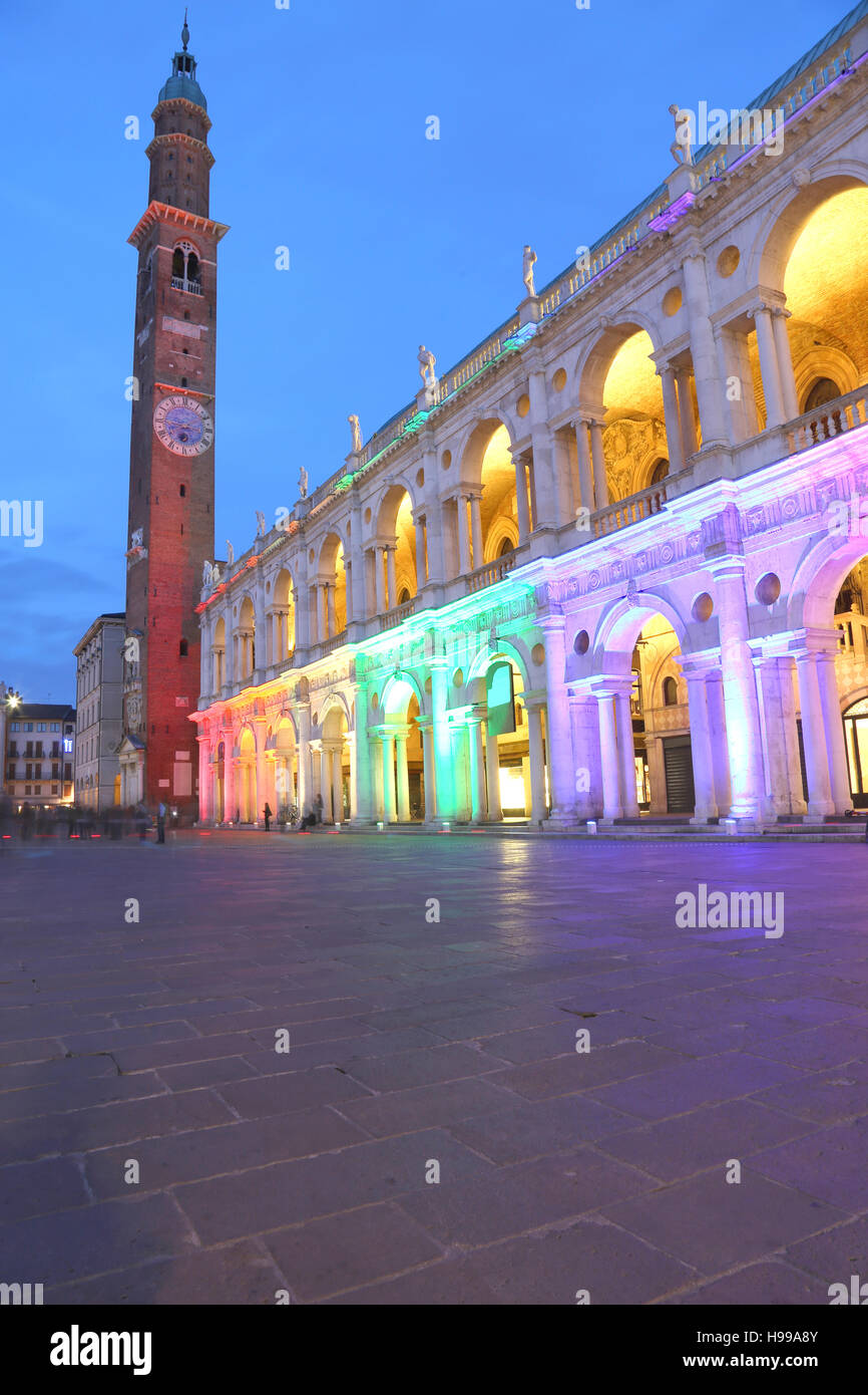 Acnient monument in classical style with multi-colored lights in the ...