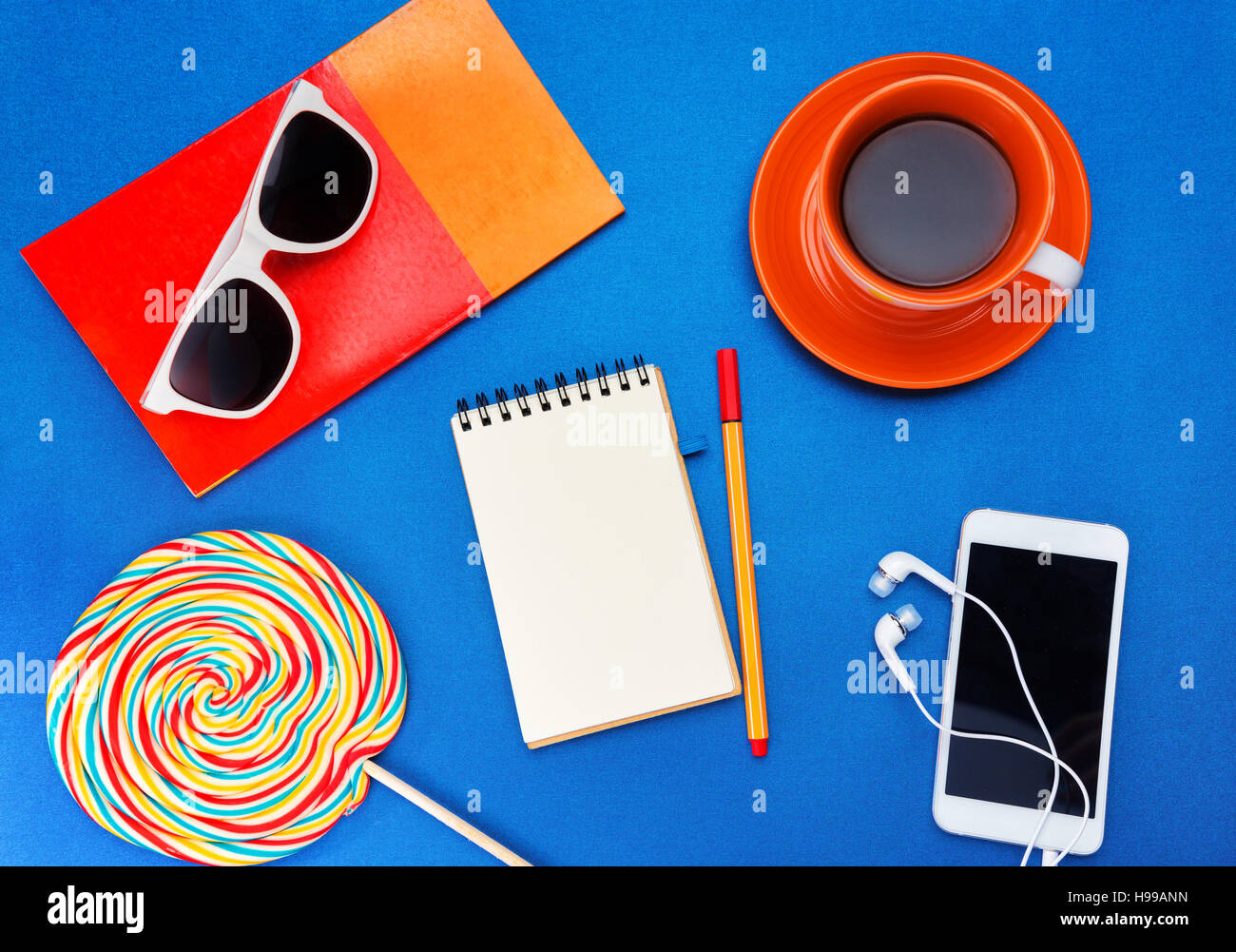 Colorful working desk. Top view Stock Photo - Alamy