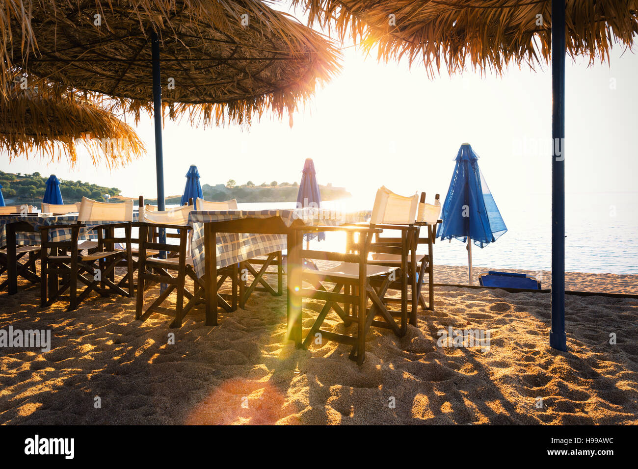 Beach restaurant in summer time Stock Photo - Alamy