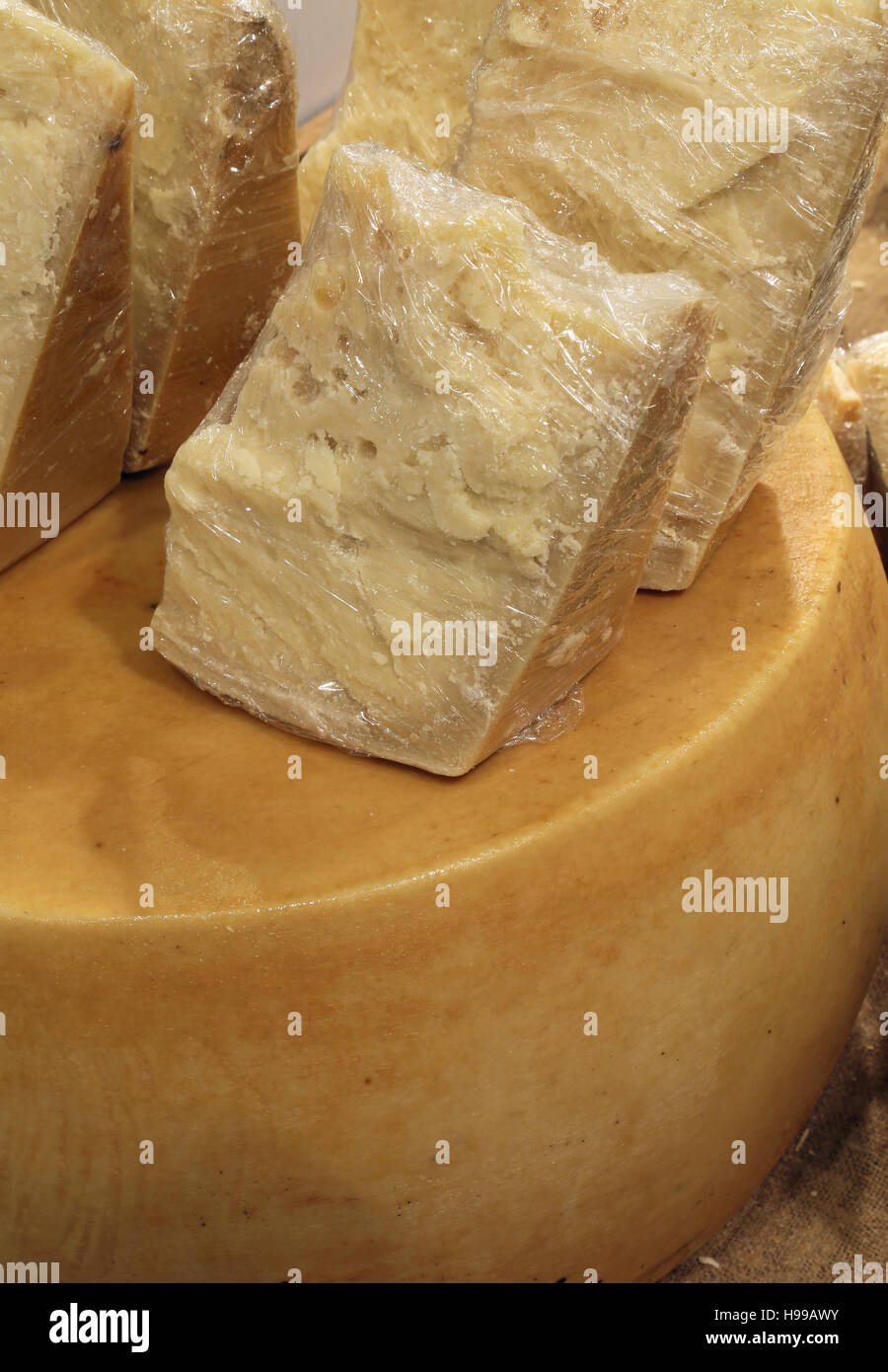 many pieces of original Italian Parmesan on sale in the mountain dairy ...
