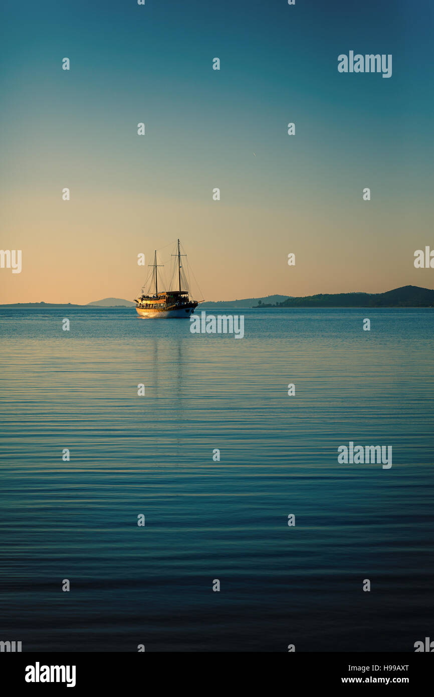 Blue sea background. Ship on the sea horizon Stock Photo - Alamy