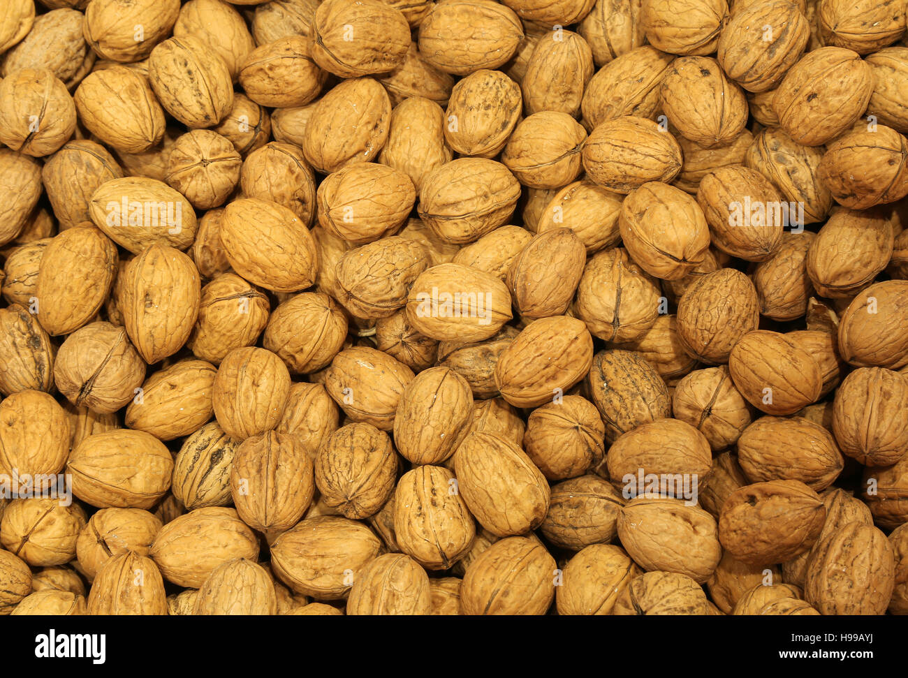 Background of freshly picked ripe genuine walnuts Stock Photo - Alamy