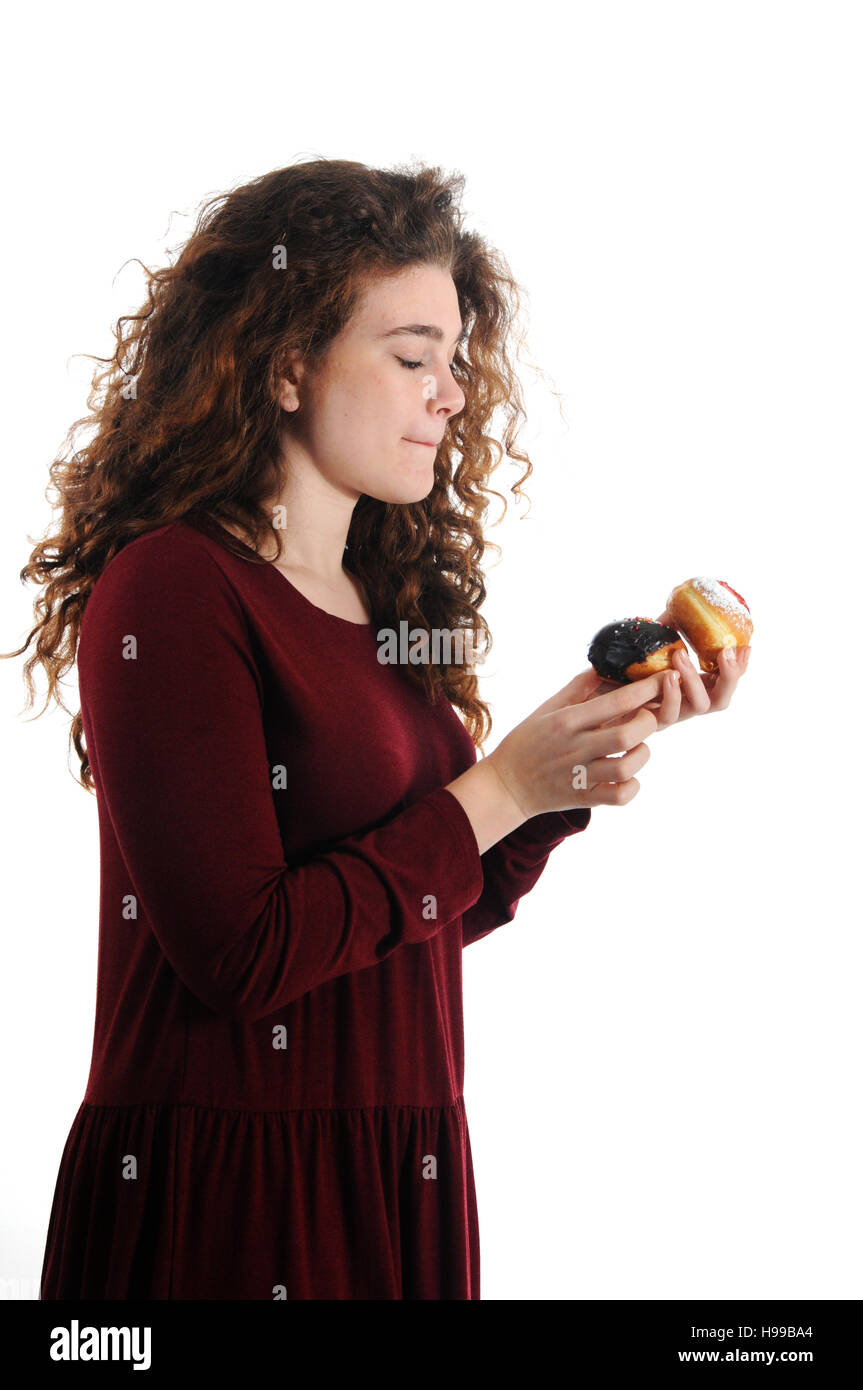 Hanukkah donut and beautiful woman Tempting expression Stock Photo - Alamy