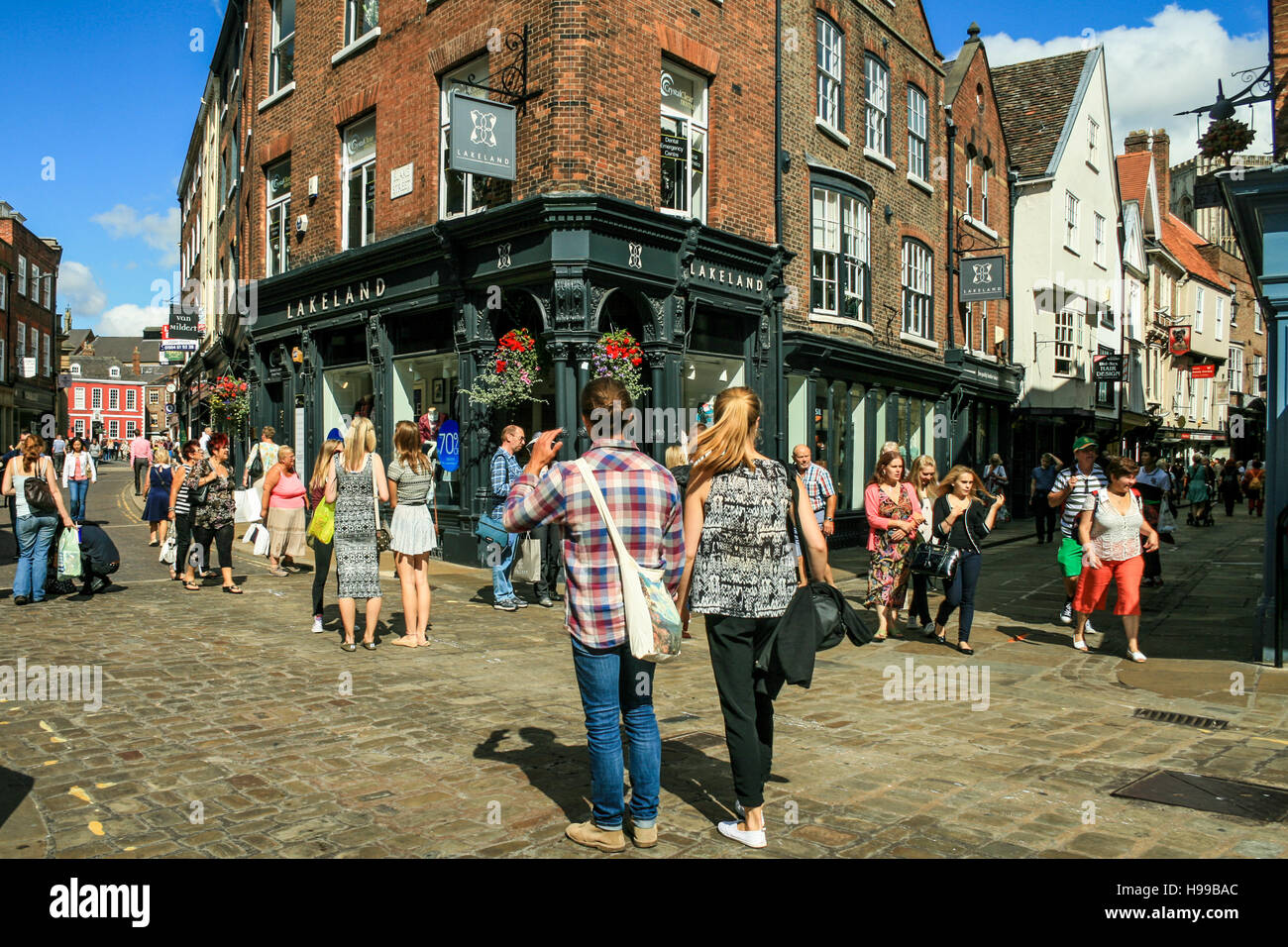 Locals,tourist and visitors enjoying a day out in the old city of York ...
