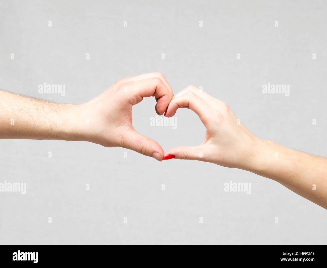 Making heart with arms hi-res stock photography and images - Alamy