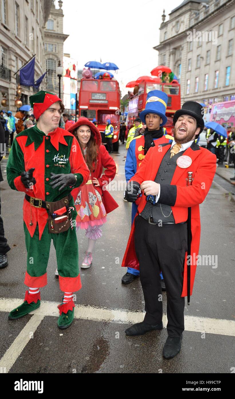 The 'Hamleys Ringmaster' (right) and other characters attend the second ...