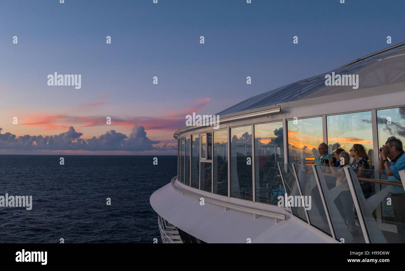 People leaning on the rail of Royal Caribbean Harmony of the Seas ...