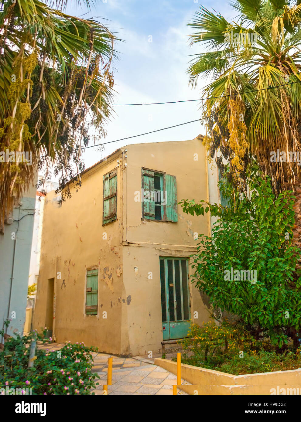 The old house in poor residential neighborhood of Heraklion, Crete ...