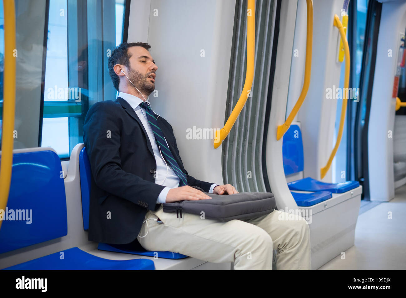 Sleeping Train Commuter High Resolution Stock Photography and Images ...