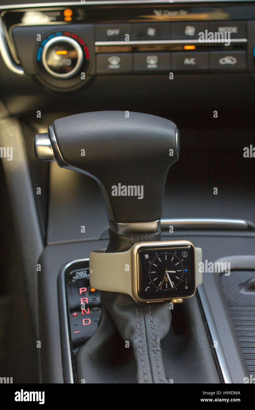 Modern car interior with smart watch on gear stick Stock Photo - Alamy