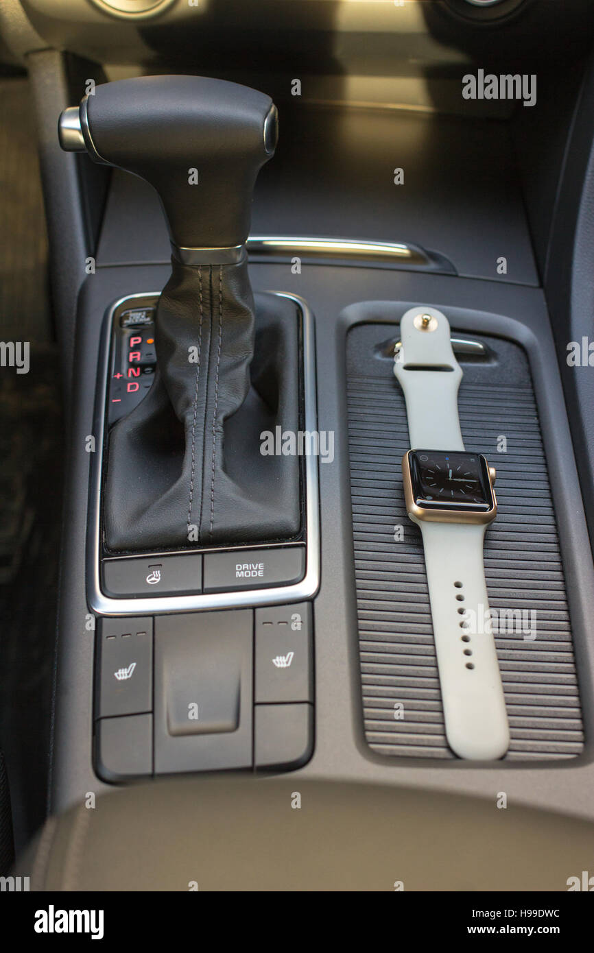 Modern car interior with smart watch on gear stick Stock Photo - Alamy