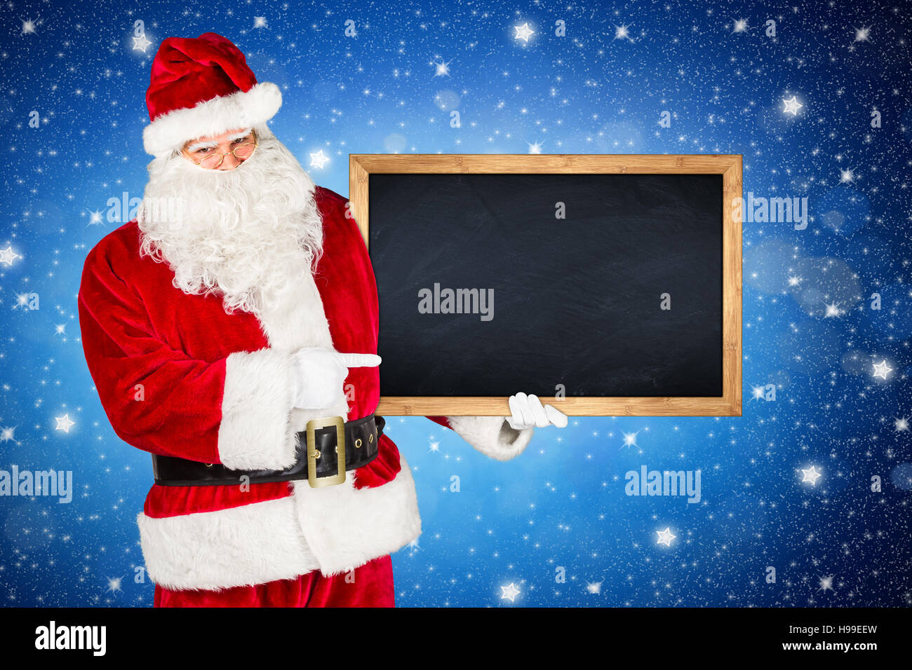 traditional classic red white santa claus making pointing with his ...