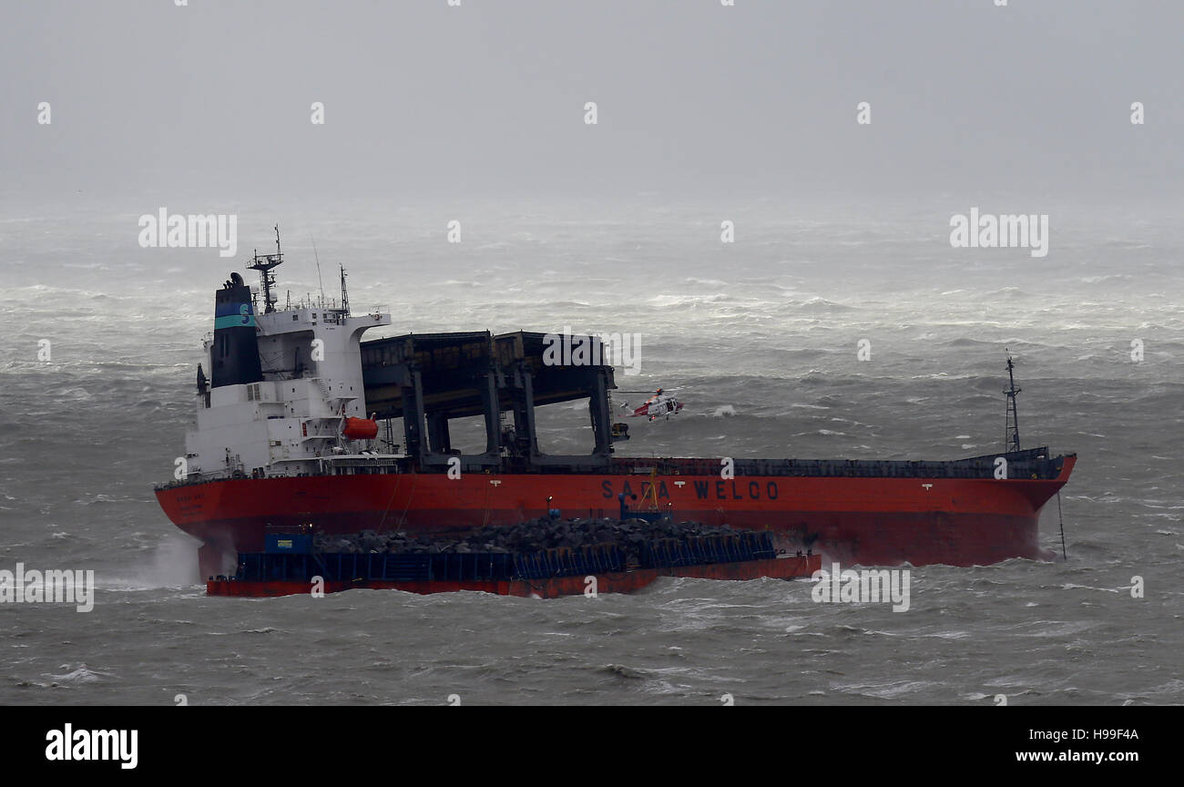 Visible damage to the side of a cargo ship which got into difficulty in ...