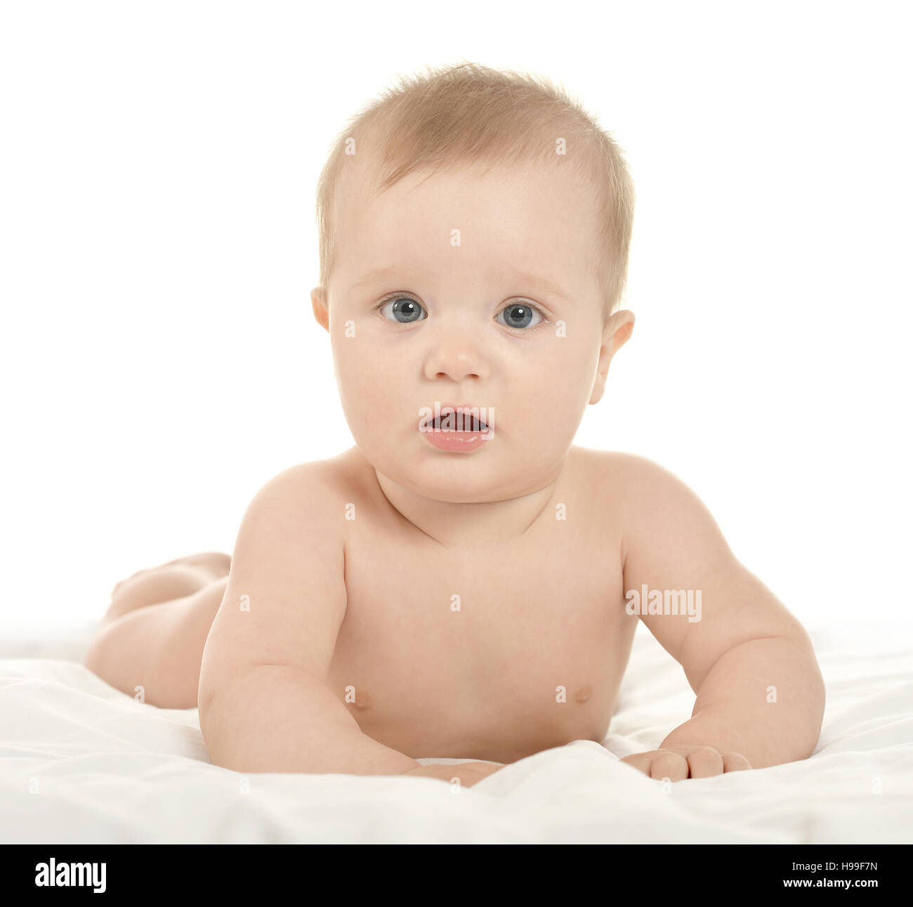 Baby boy lying on blanket Stock Photo - Alamy