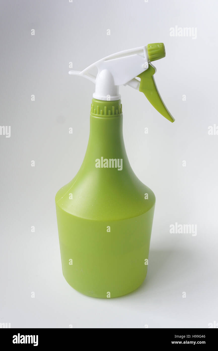 A green spray bottle Stock Photo - Alamy