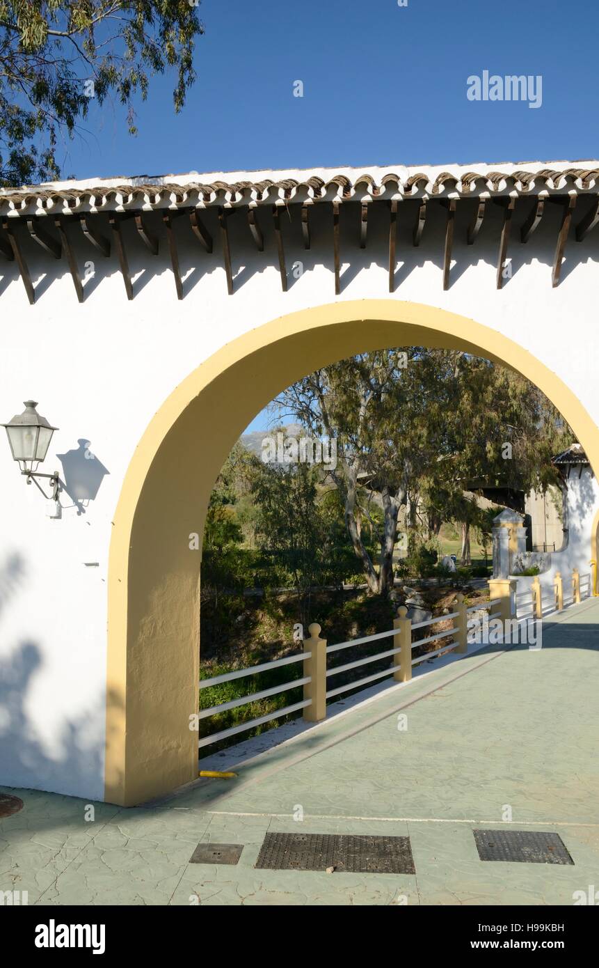 The mountain through an arch of a little bridge in Marbella, Spain ...