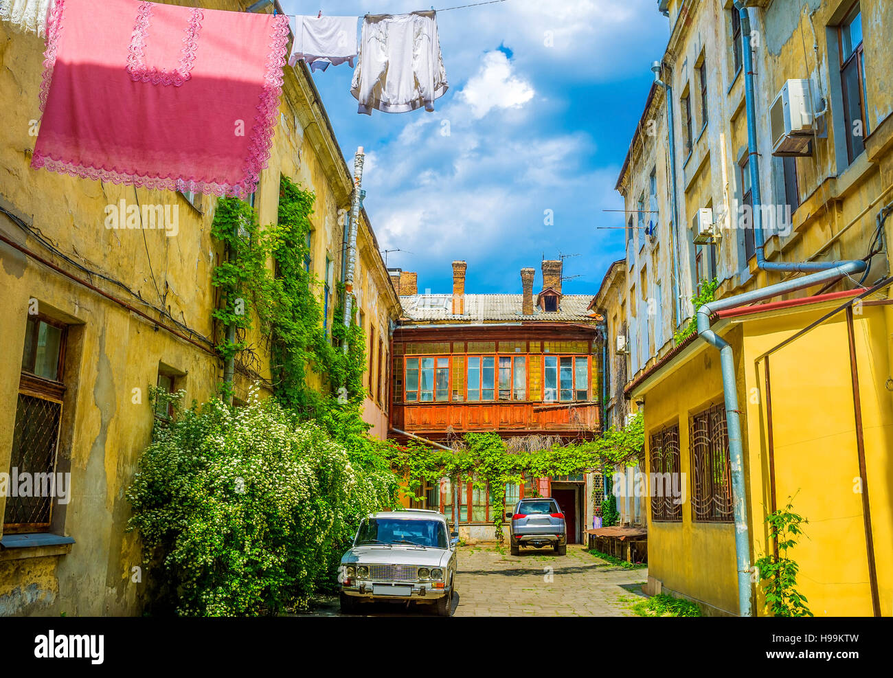 The cozy courtyard is a part of an old Odessa in the modern city Stock ...