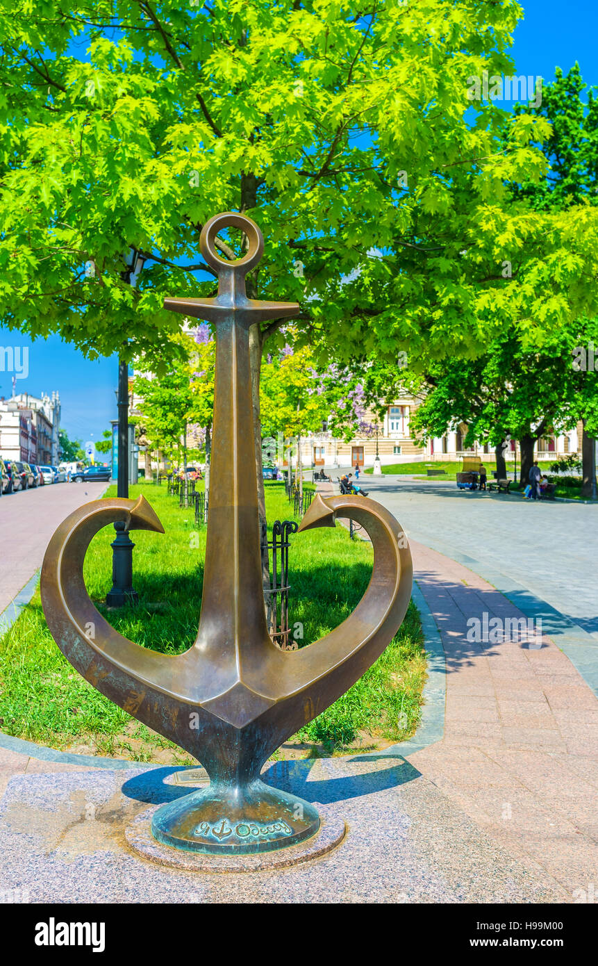 The bronze archor is the symbol of the city located next to the Opera ...