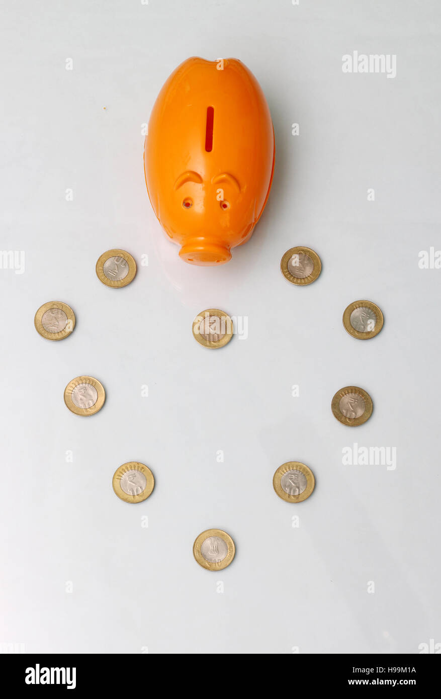 Piggy bank and ten rupee coin of India. Love pattern design Stock Photo ...