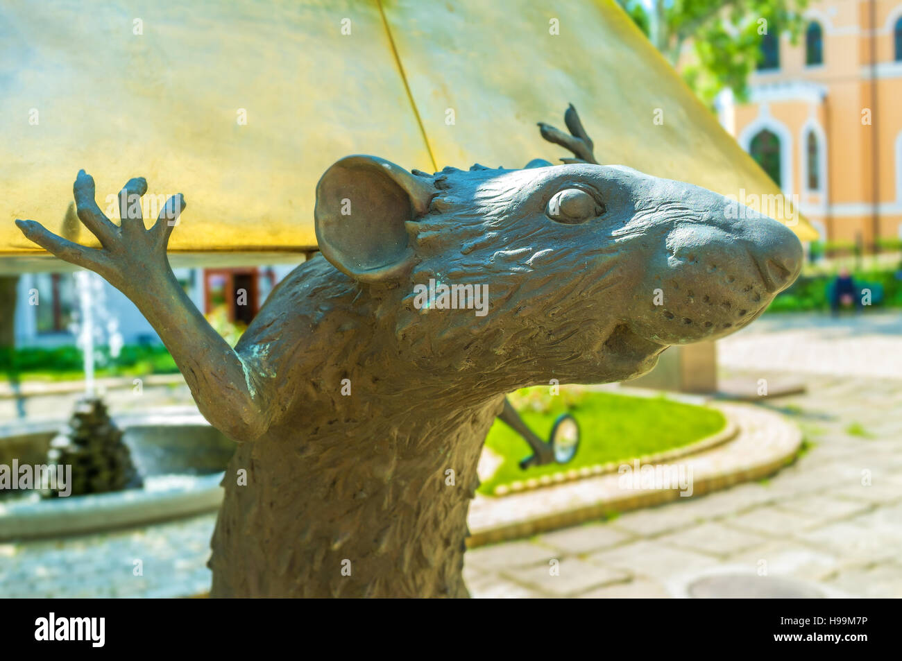 The rat holding the pyramid is the element of the composition "the ...