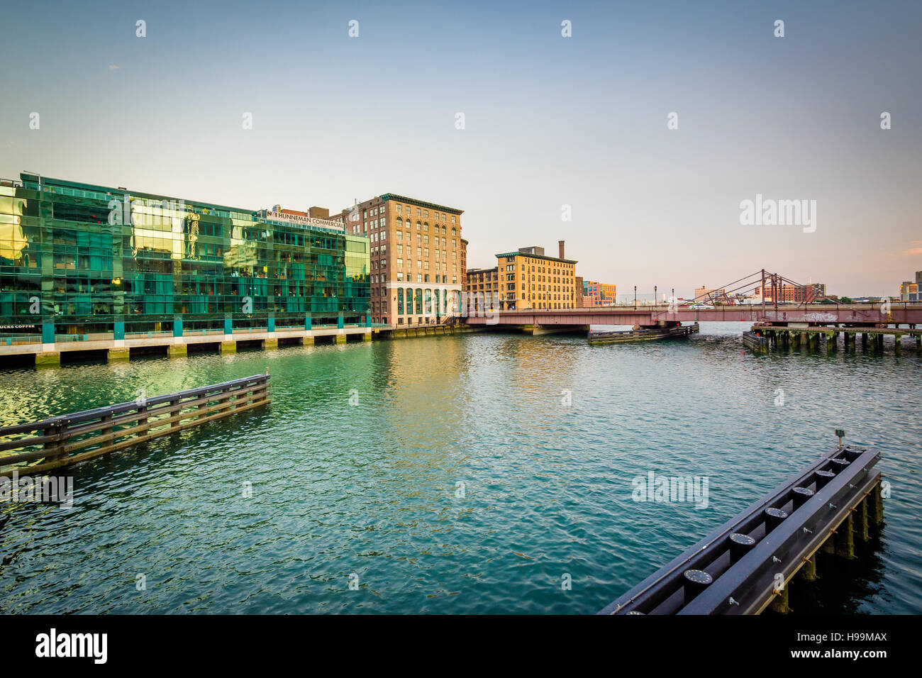 Buildings along Fort Point Channel at sunset, in Boston, Massachusetts ...