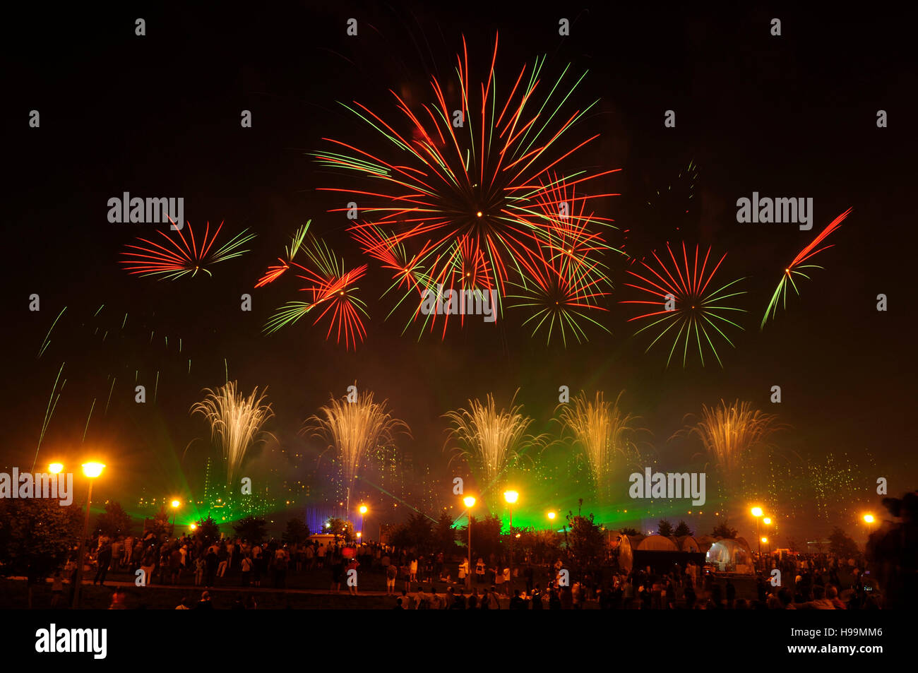Fireworks and spectators Stock Photo - Alamy