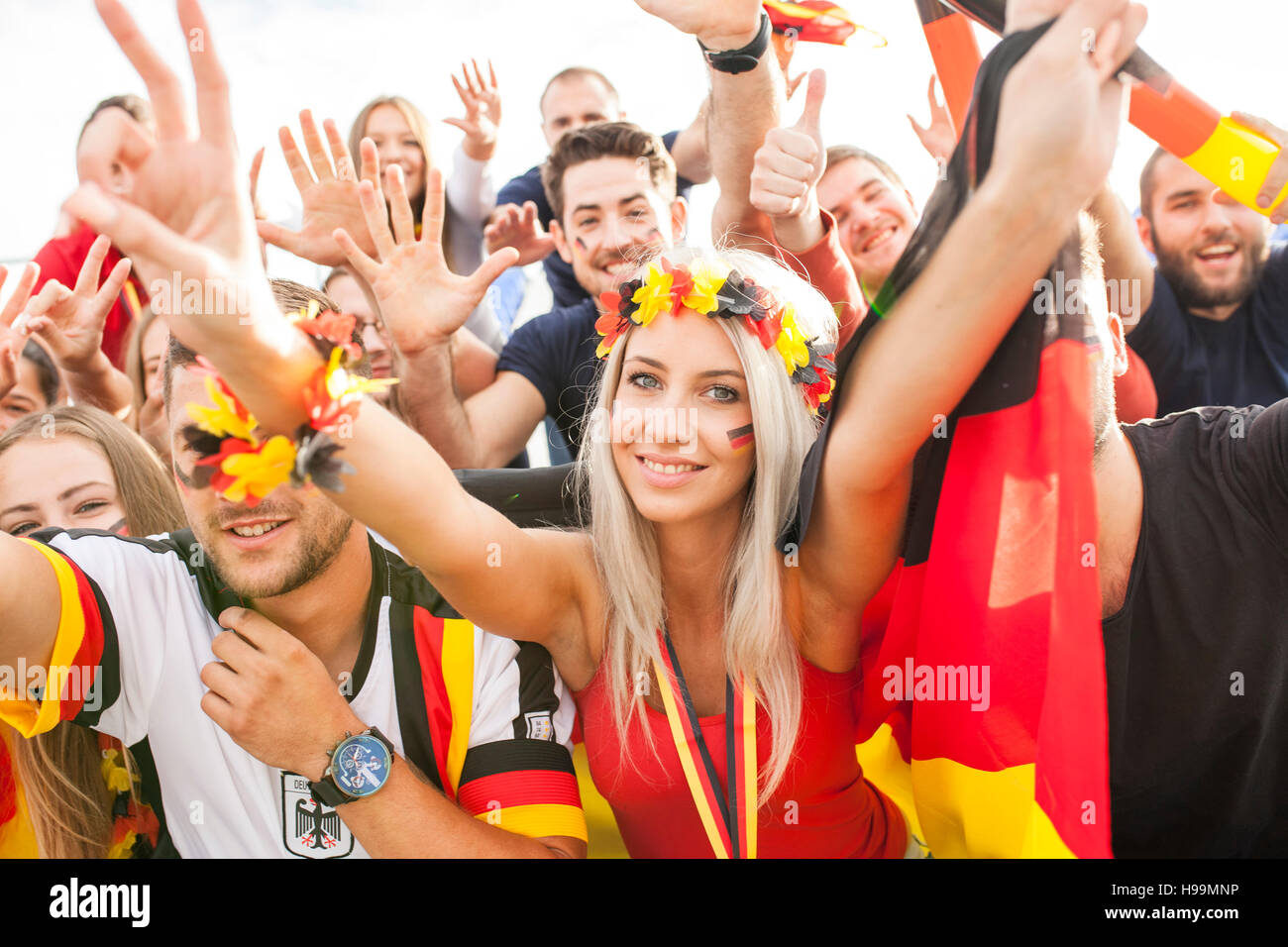Group of German soccer fans cheering Stock Photo - Alamy