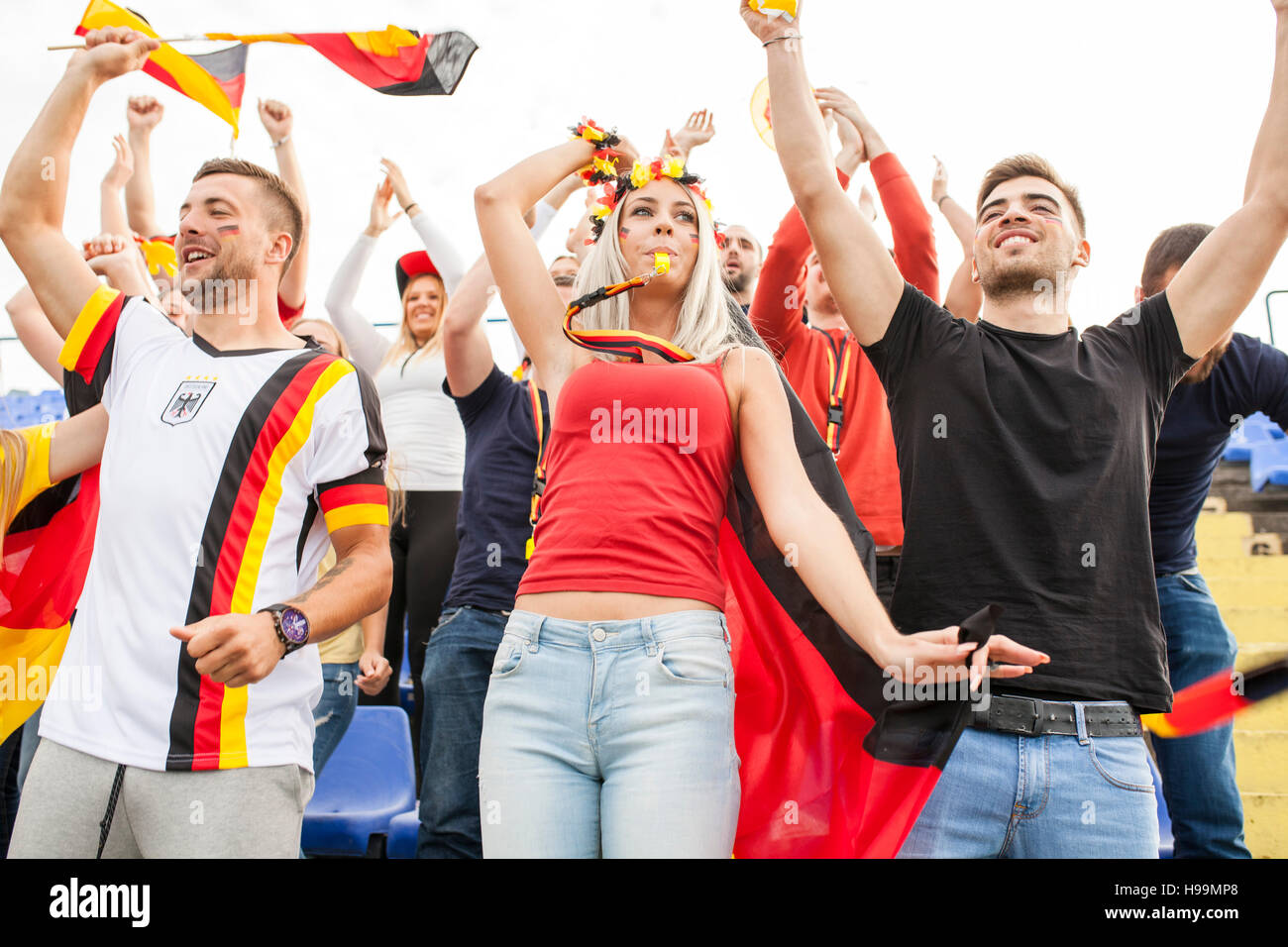 Group of German soccer fans cheering Stock Photo - Alamy