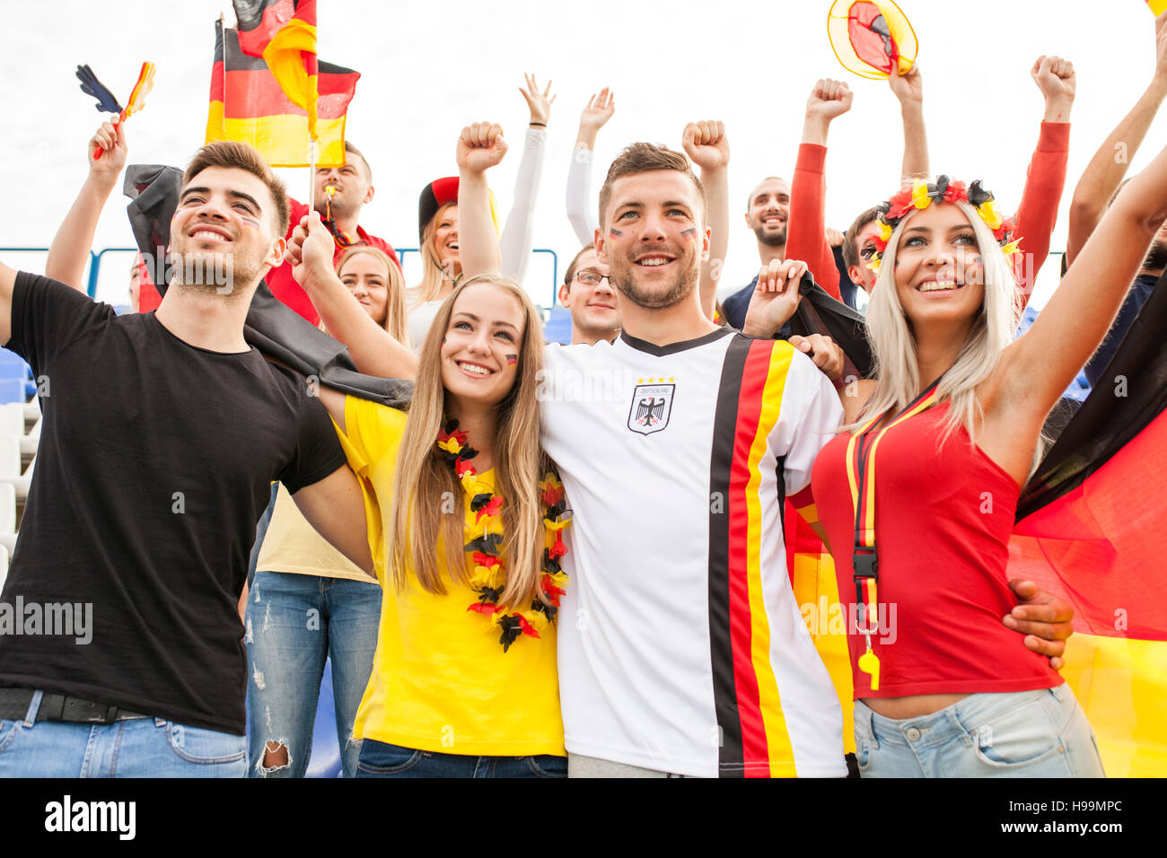 Group of German soccer fans cheering Stock Photo - Alamy