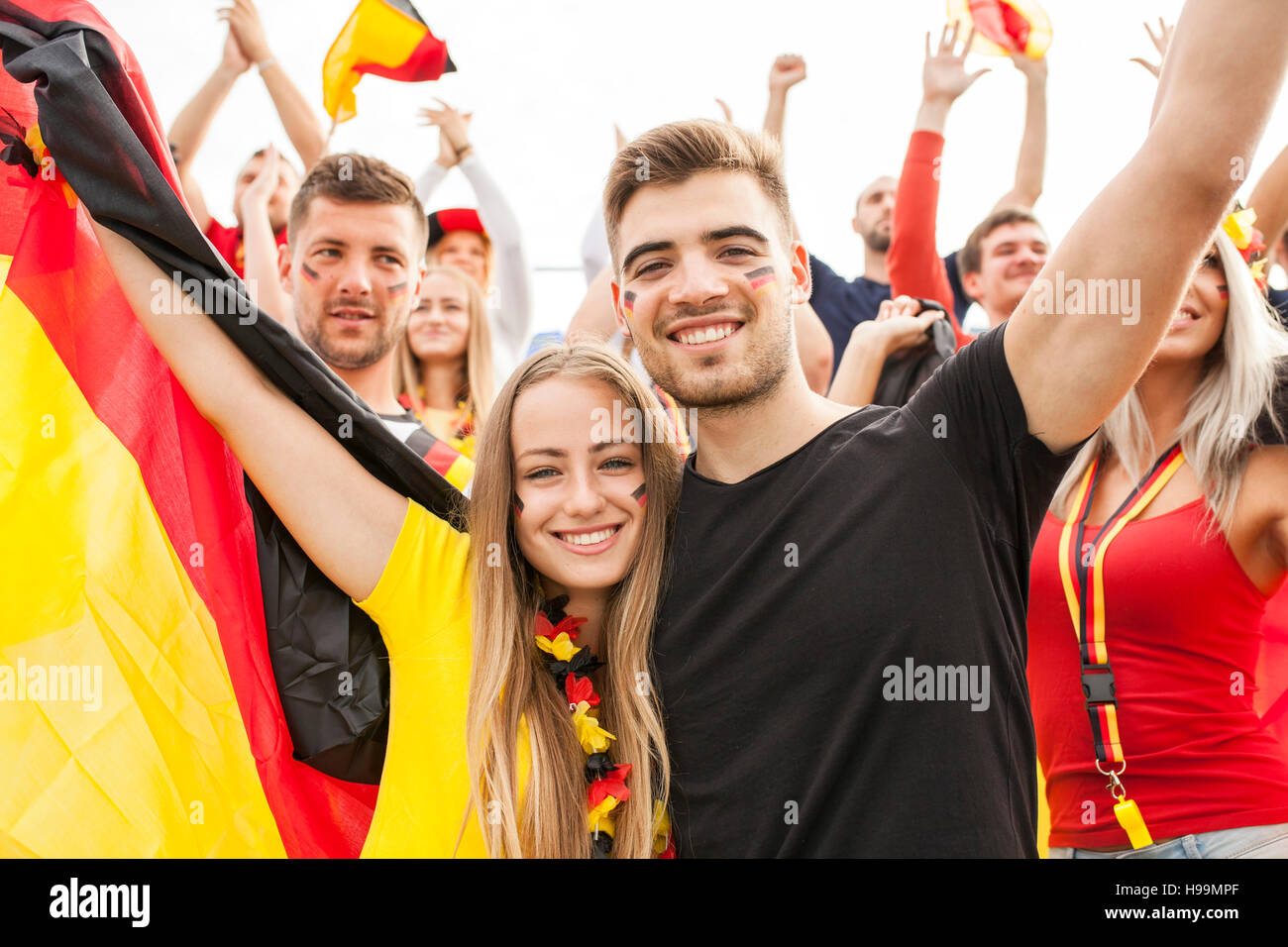 Group of German soccer fans cheering Stock Photo - Alamy
