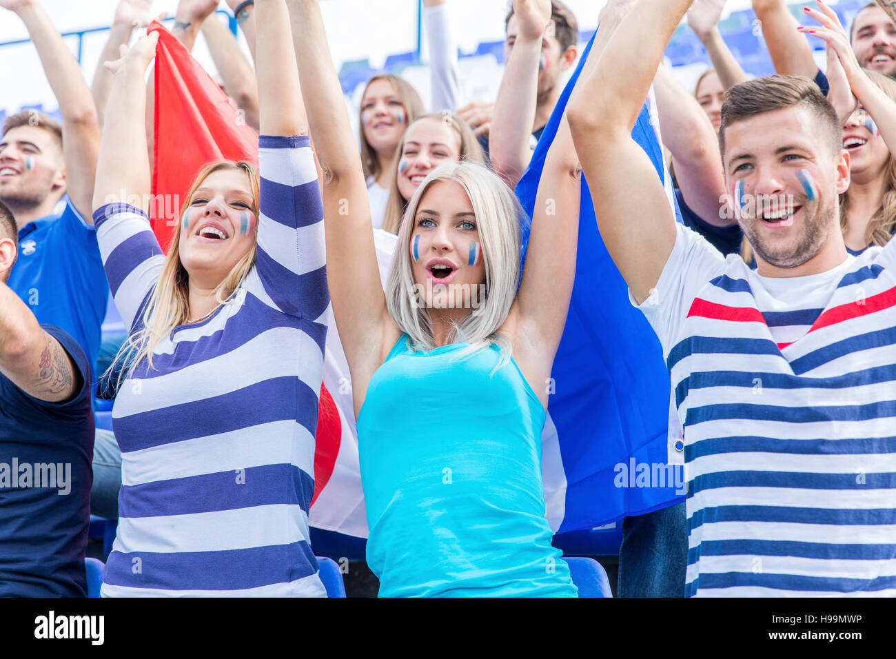 Crowd shouting cheering excitement support hi-res stock photography and ...