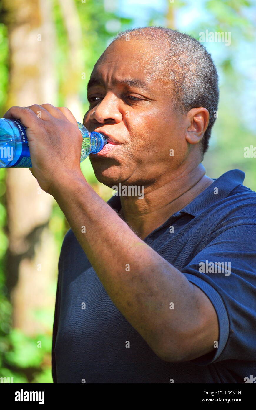 Man in summer heat Stock Photo - Alamy