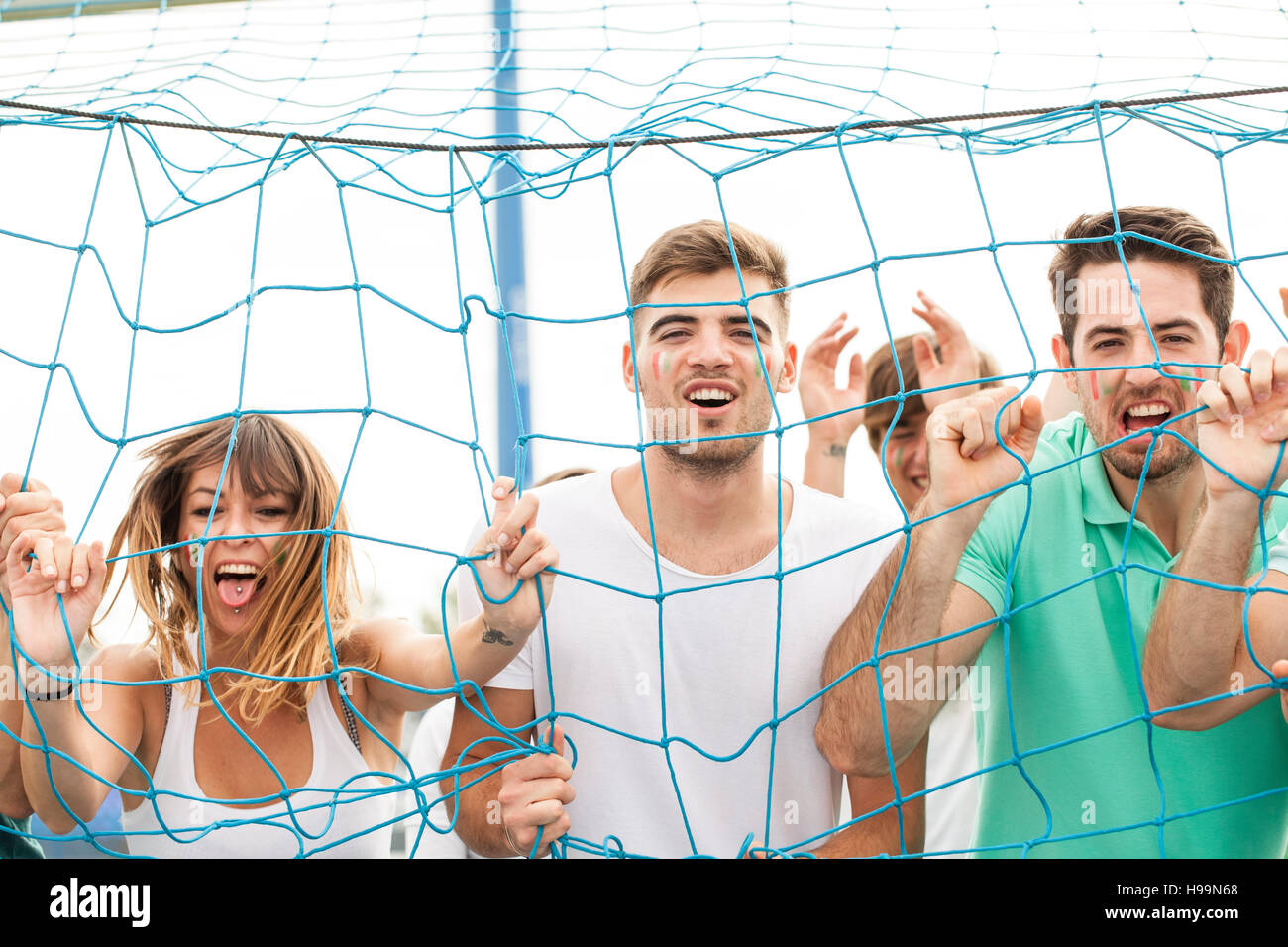 Cheering fans behind hi-res stock photography and images - Alamy