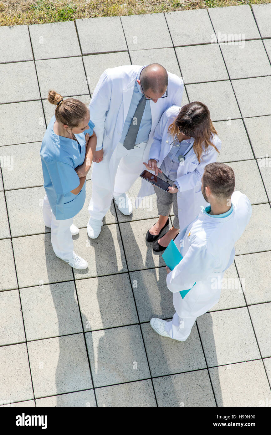 Women stand looking hi-res stock photography and images - Alamy