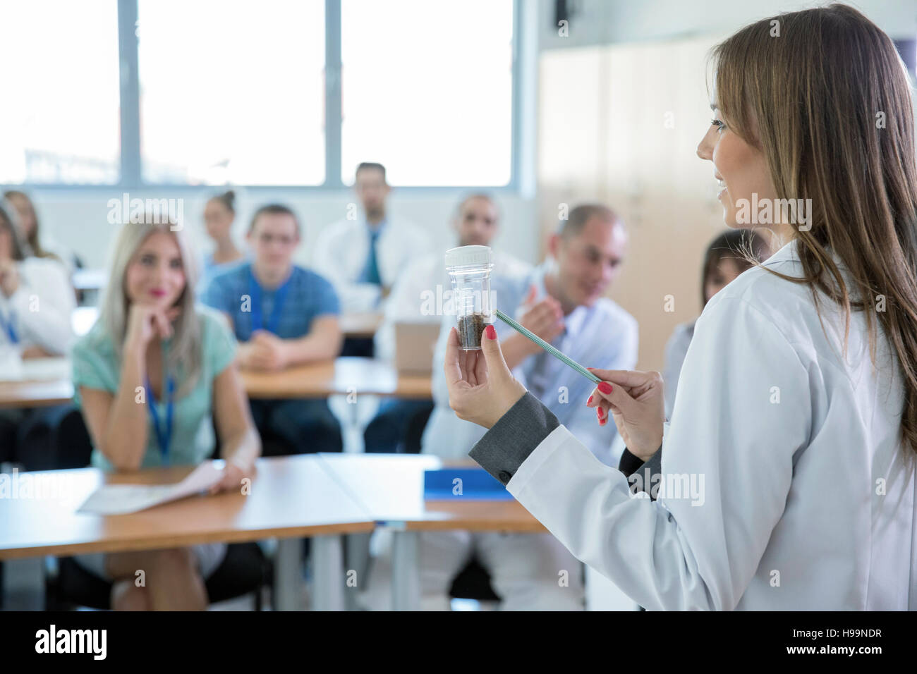 Teaching explaining class hi-res stock photography and images - Alamy