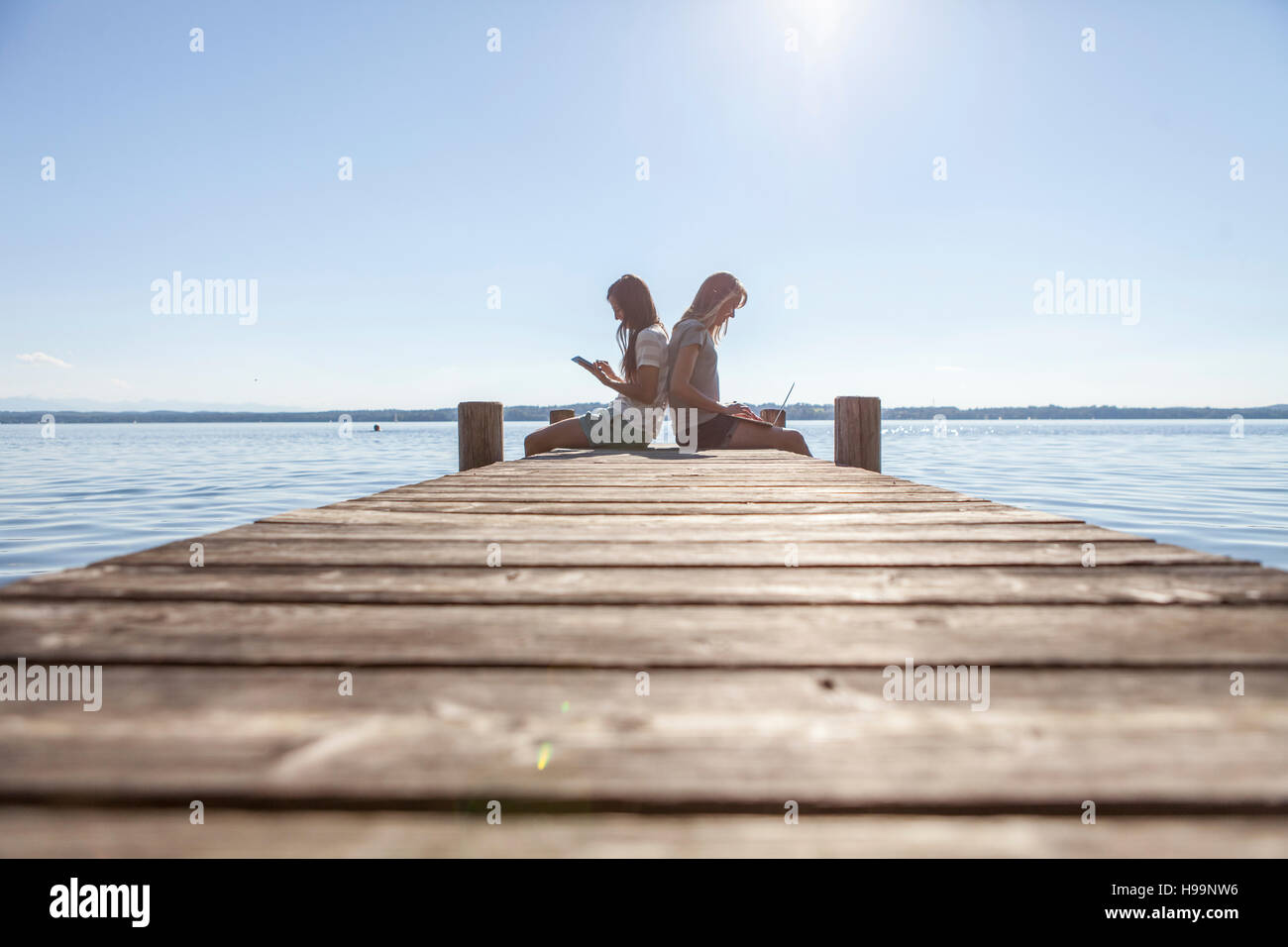 Sit two women hi-res stock photography and images - Alamy