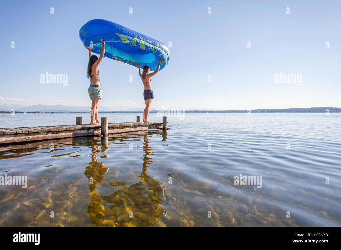 Woman inflatable raft hi-res stock photography and images - Alamy
