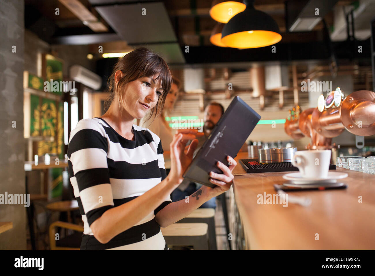 Woman in coffee shop hi-res stock photography and images - Alamy