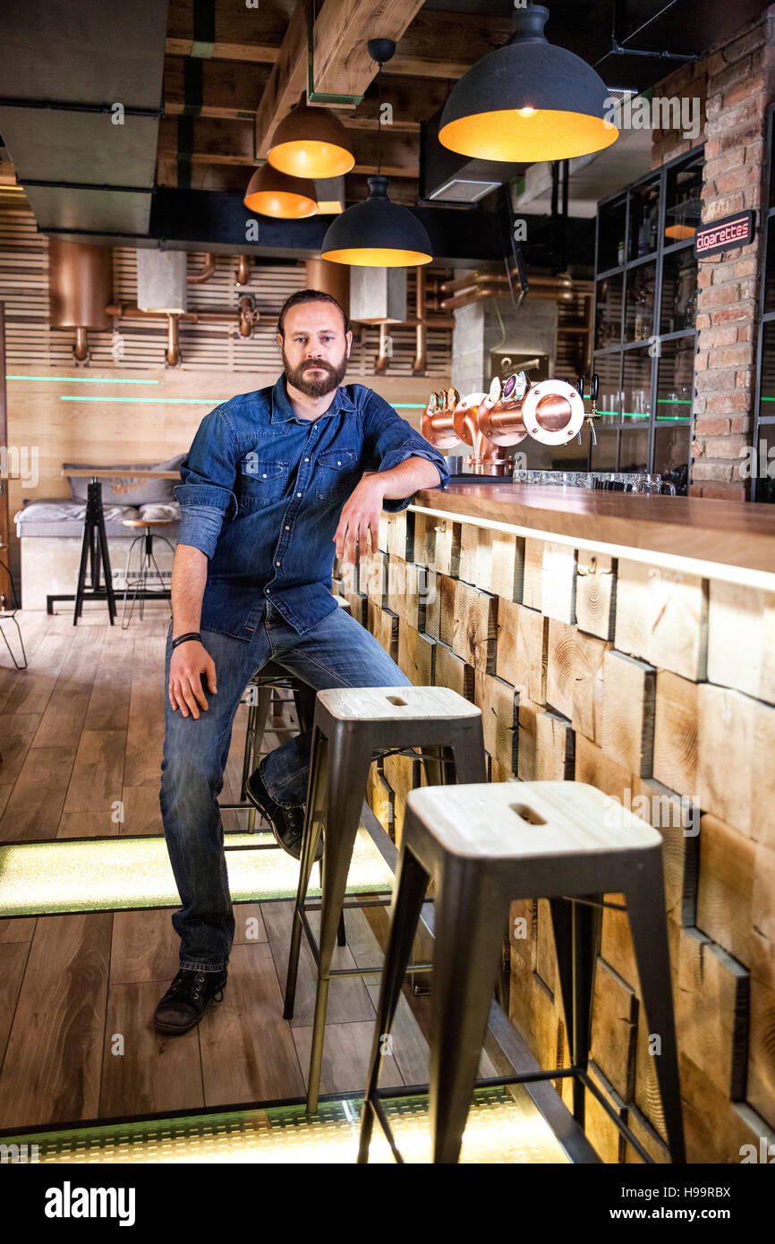 Man at bar counter hi-res stock photography and images - Alamy