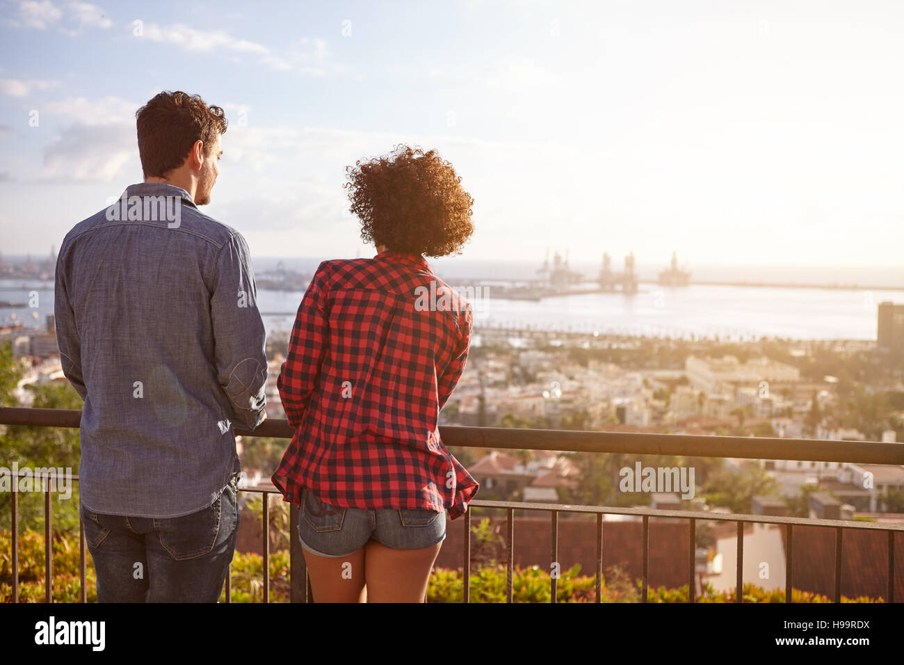 Couple looking over a bridge hi-res stock photography and images - Alamy