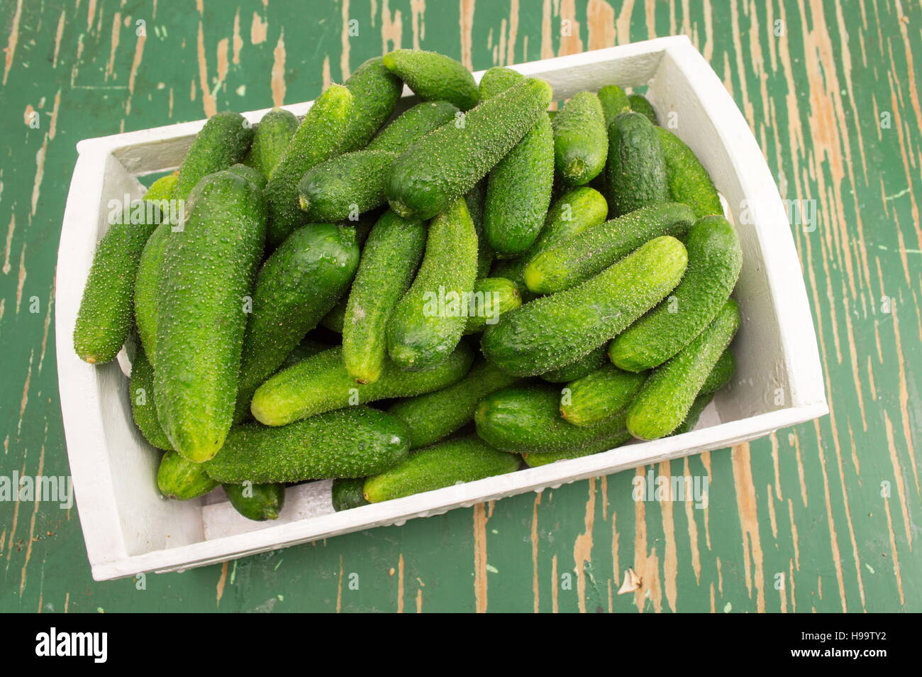 Fresh raw cucumbers in a wooden box Stock Photo - Alamy