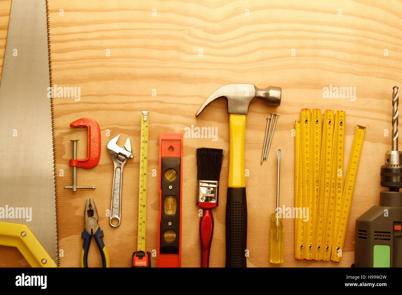 Assorted work tools on wood Stock Photo - Alamy