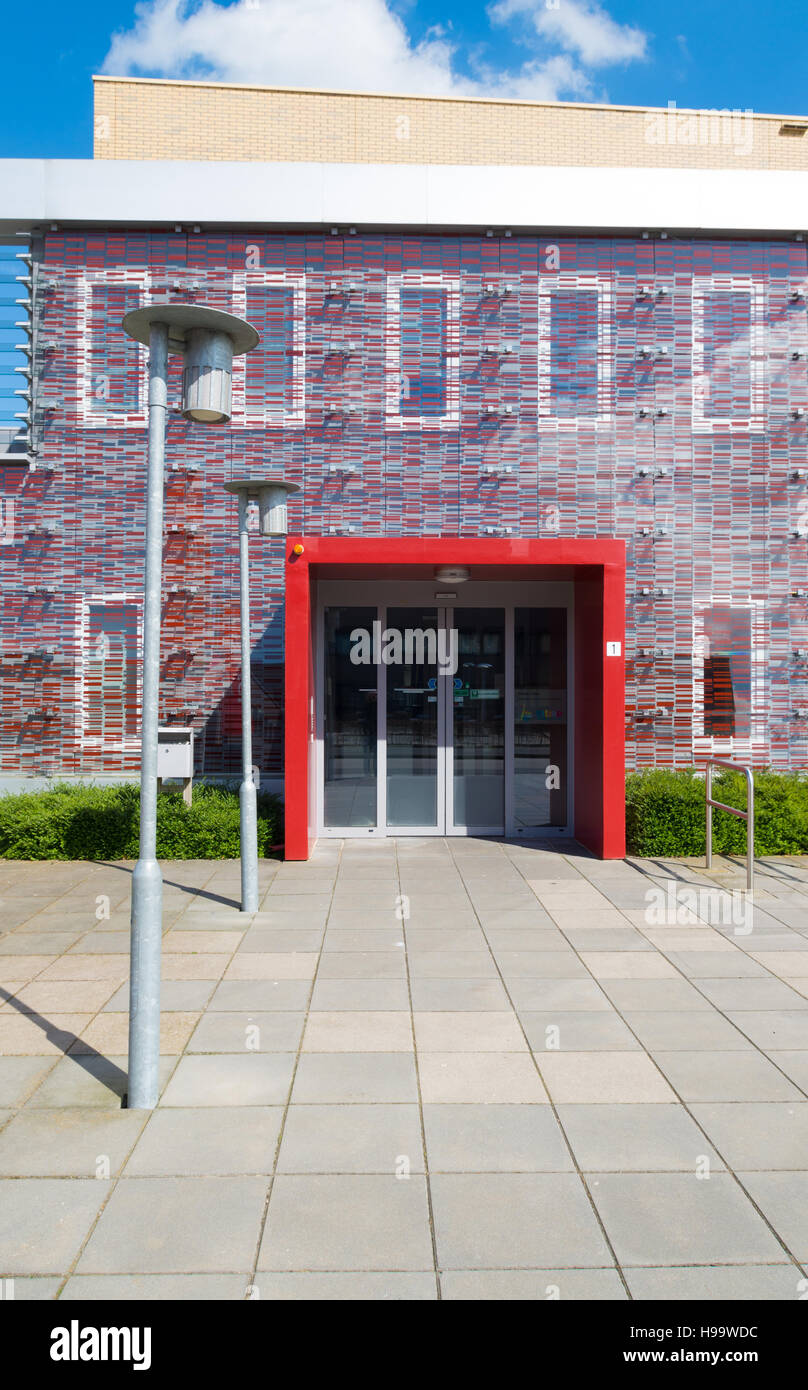 red entrance of a small modern office building Stock Photo - Alamy