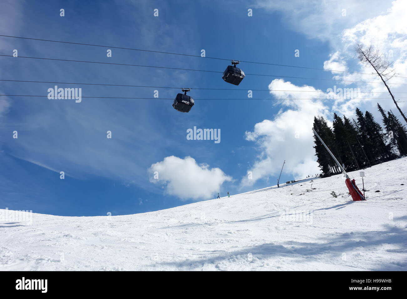Jasna resort, LIPTOV, SLOVAKIA - March 31, 2016: Blue sky and two ...