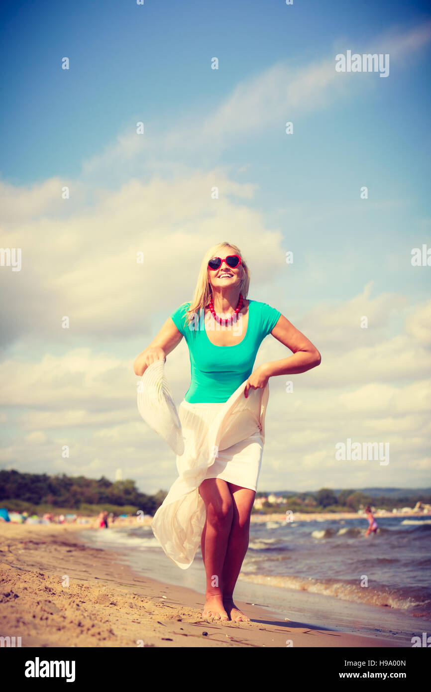 Summer time relax leisure concept. Attractive woman on the beach. Lady ...