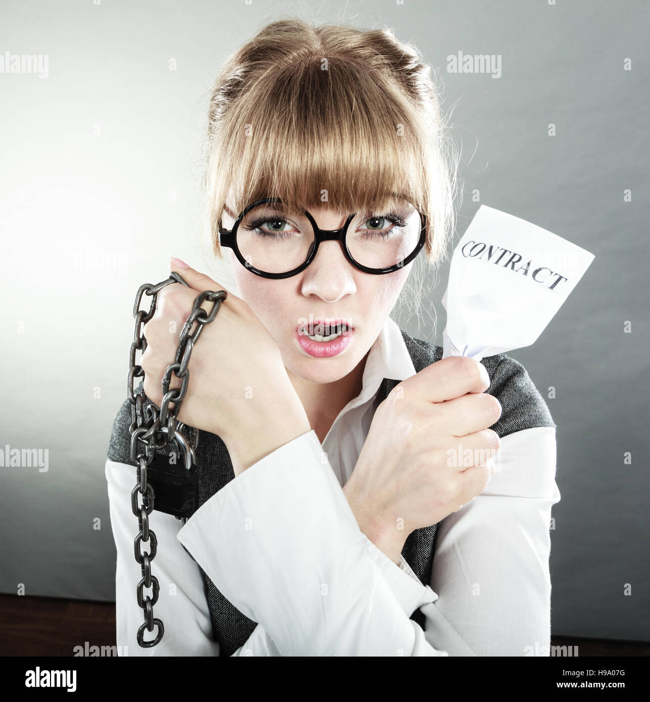 Businesswoman woman ending agreement deal. Young girl holding chain ...