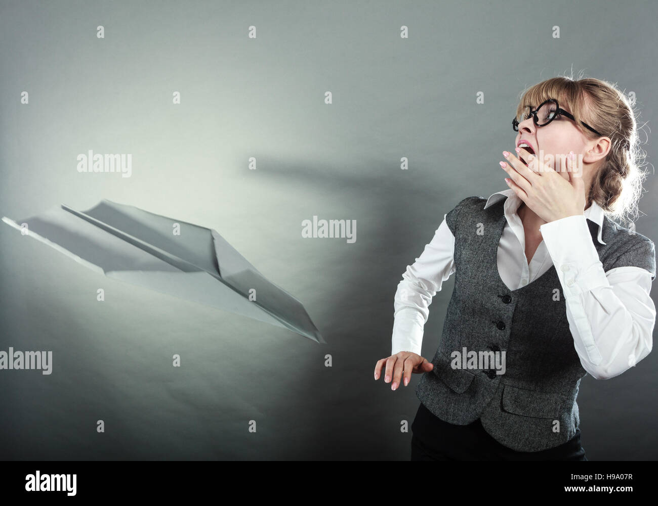 Fly fear metaphor, aerophobia concept. Scared business woman looking ...