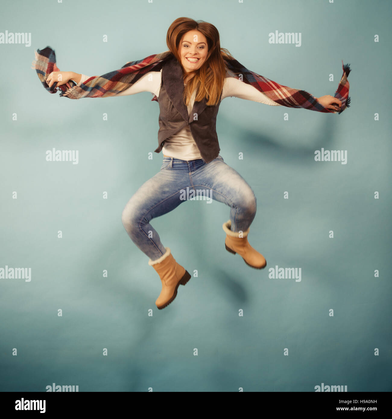 Movement fun and fashion concept. Attractive woman is jumping up ...