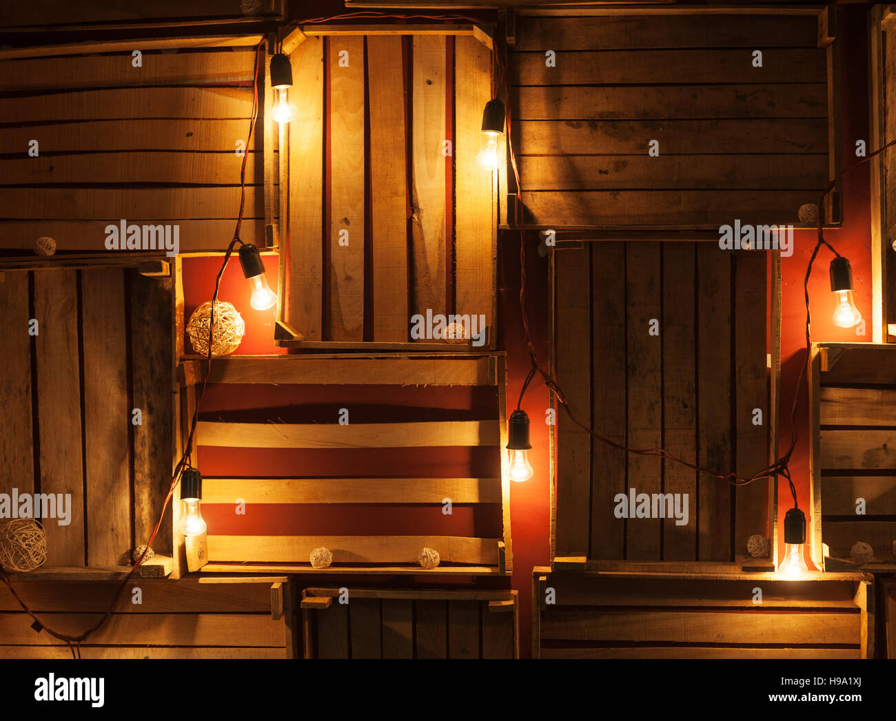 beautiful lights on wooden wall. decor for Christmas shoot Stock Photo ...